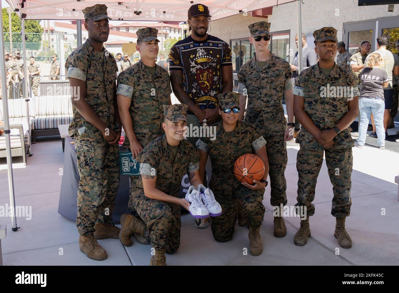 U.S. Marines pose for a photo with Kawhi Leonard, an American ...