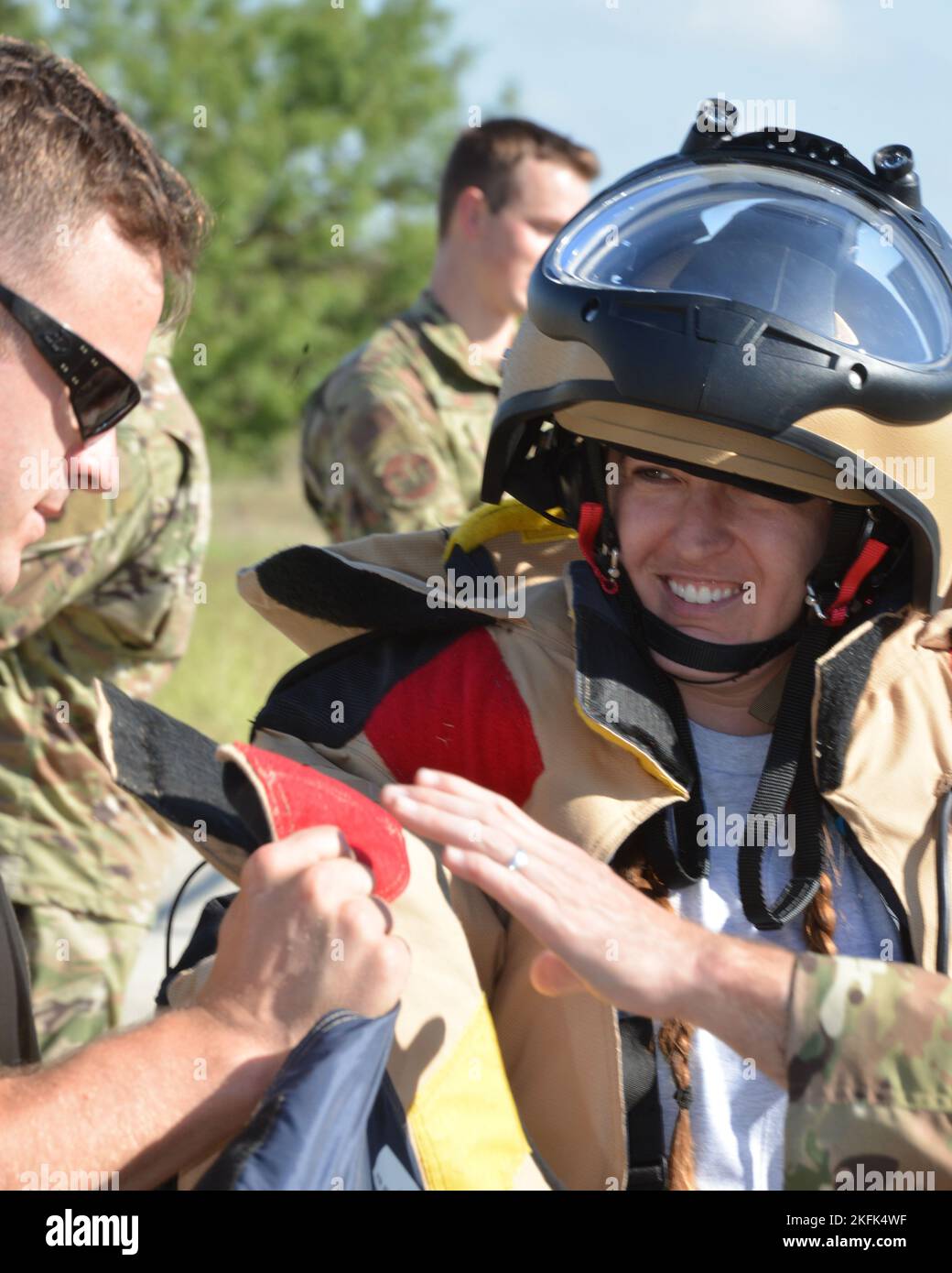 Capt Jasmine Ballard, Defense Health Agency, tries on a bomb suit at an ...