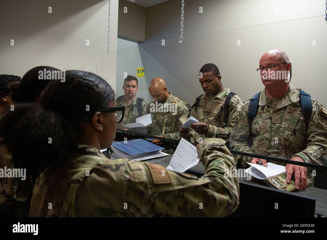 Members of the 94th Airlift Wing simulate base out-processing ...