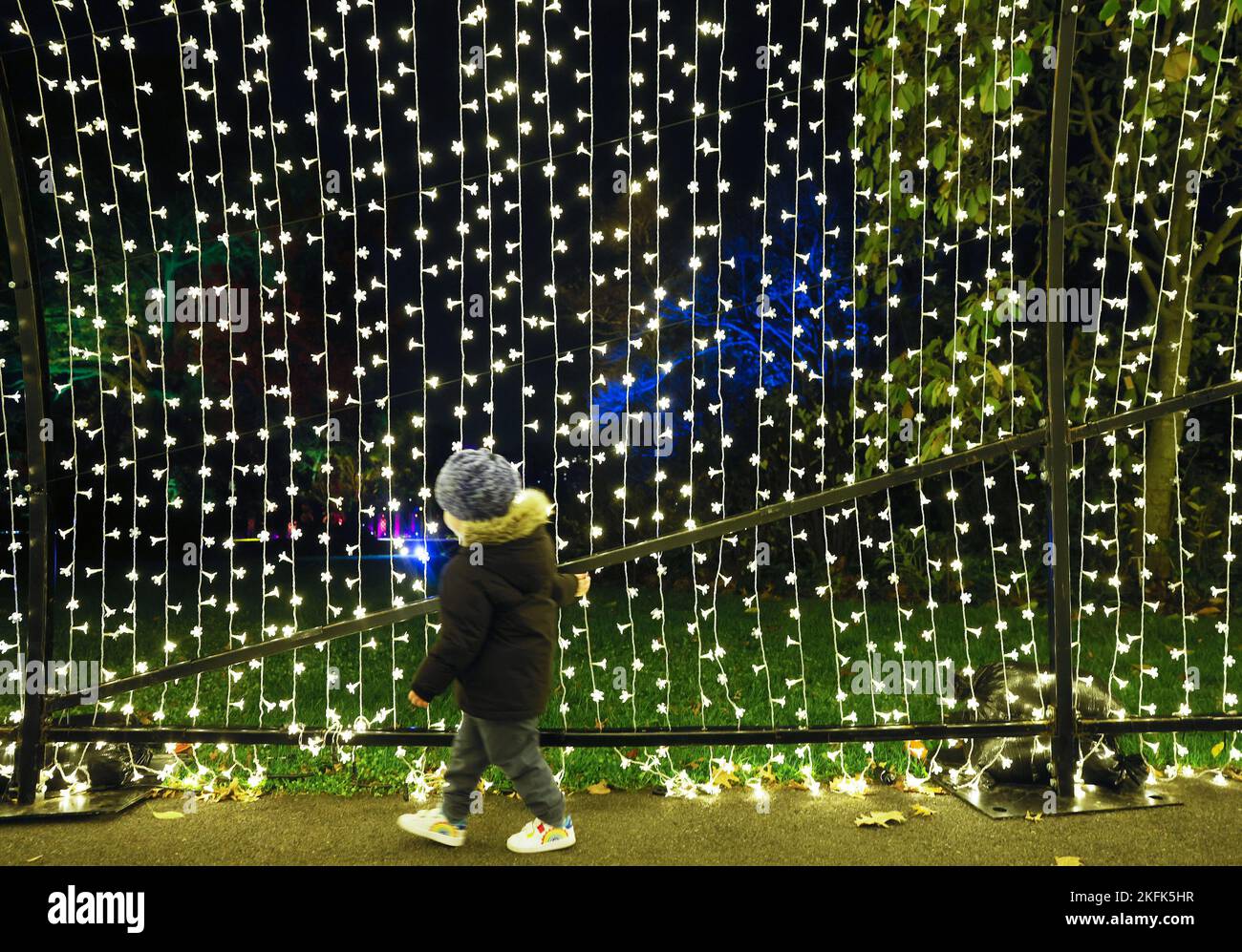 People tour the holiday light installations at Lightscape, an after ...