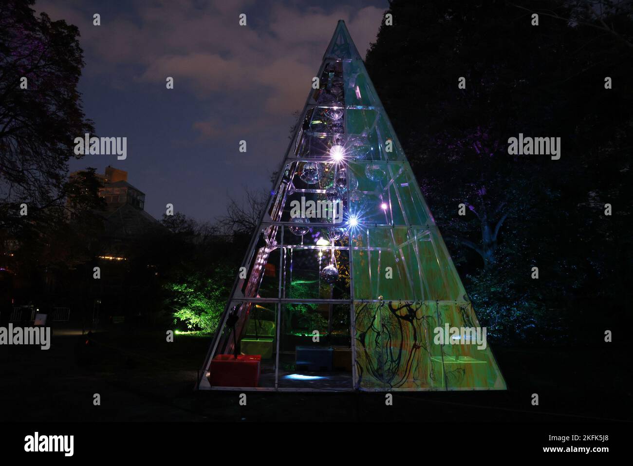 People tour the holiday light installations at Lightscape, an after ...