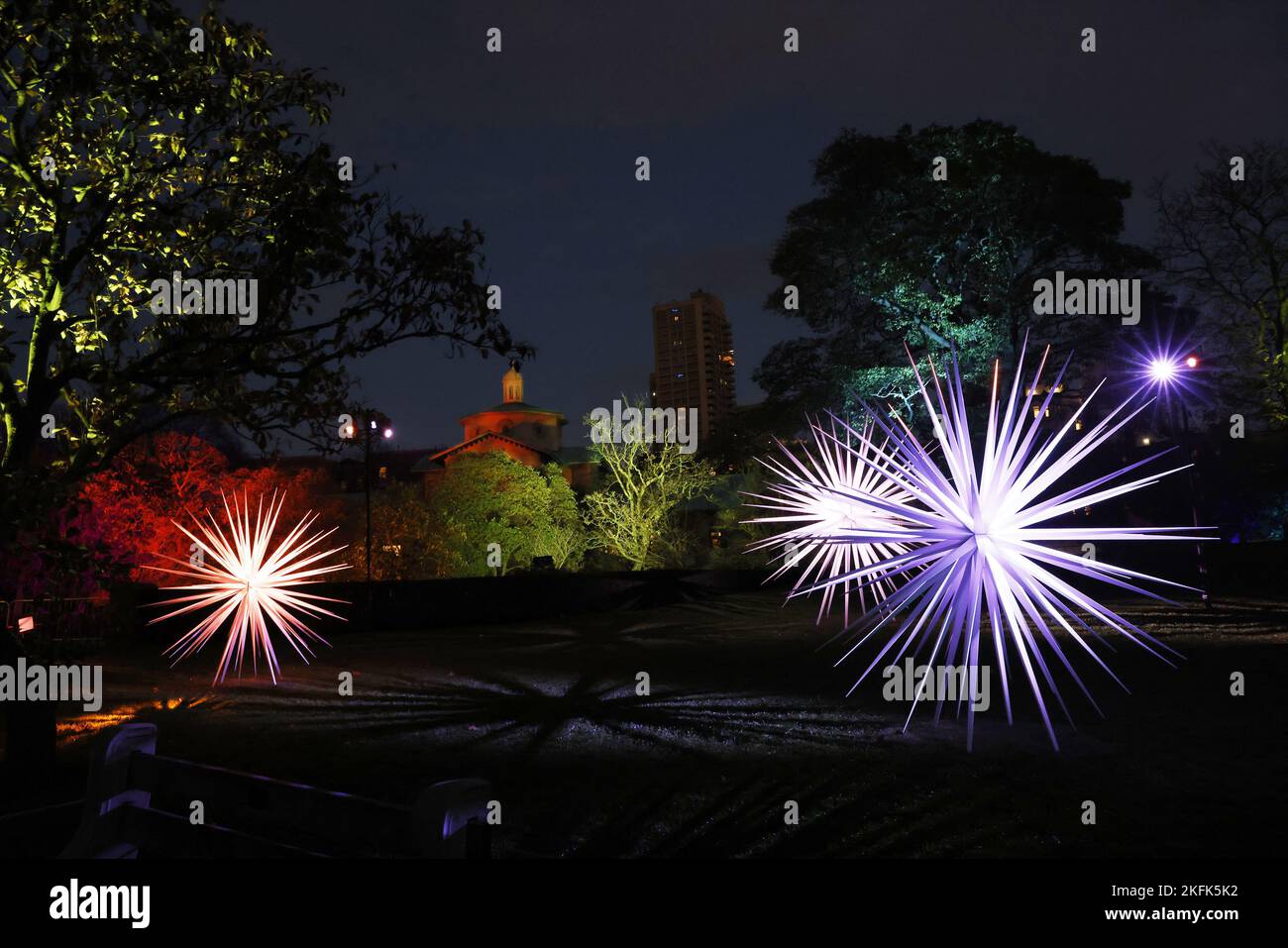 People tour the holiday light installations at Lightscape, an after ...