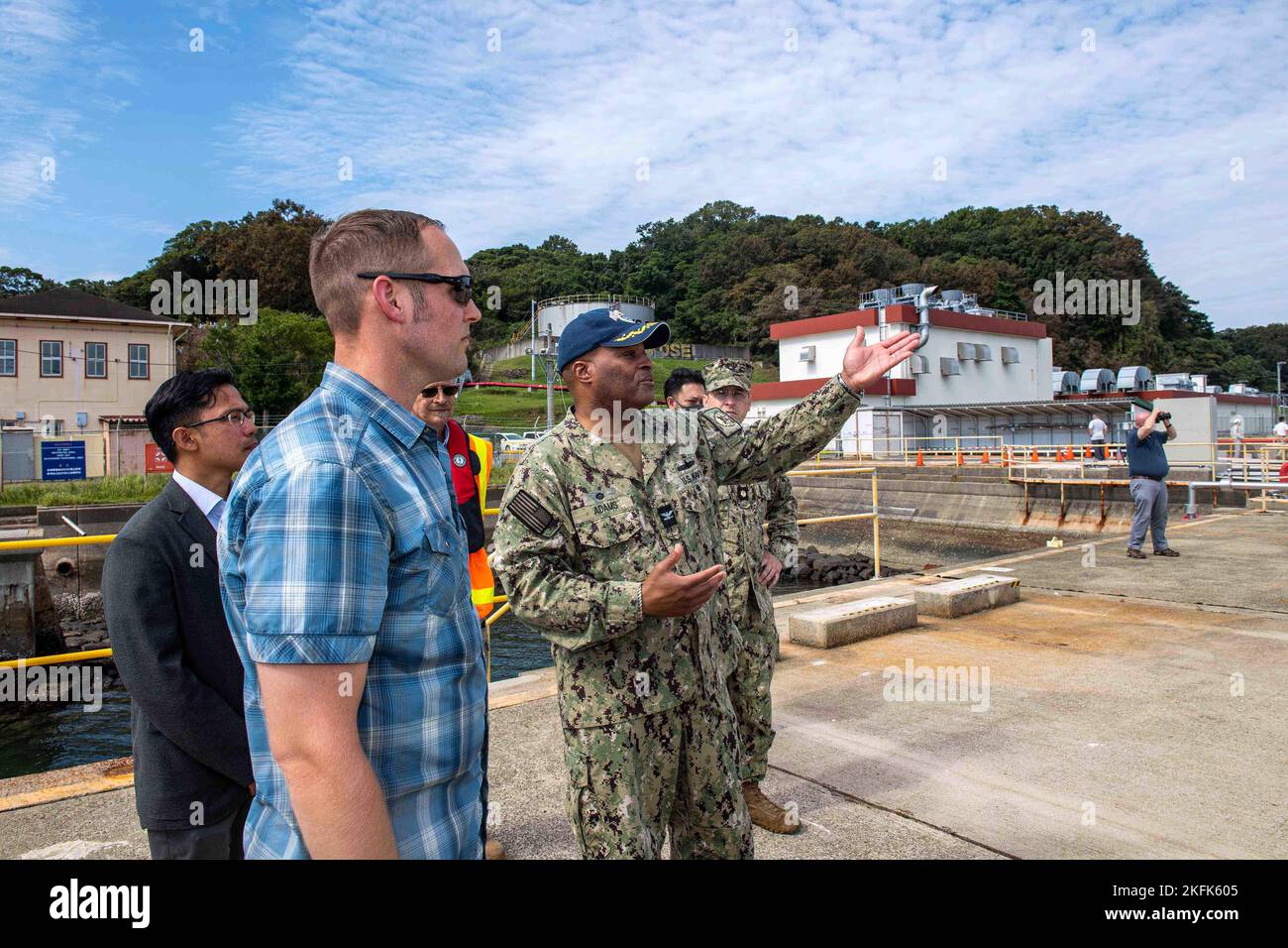 Capt. David Adams, Commander, Fleet Activities Sasebo (CFAS), speaks ...