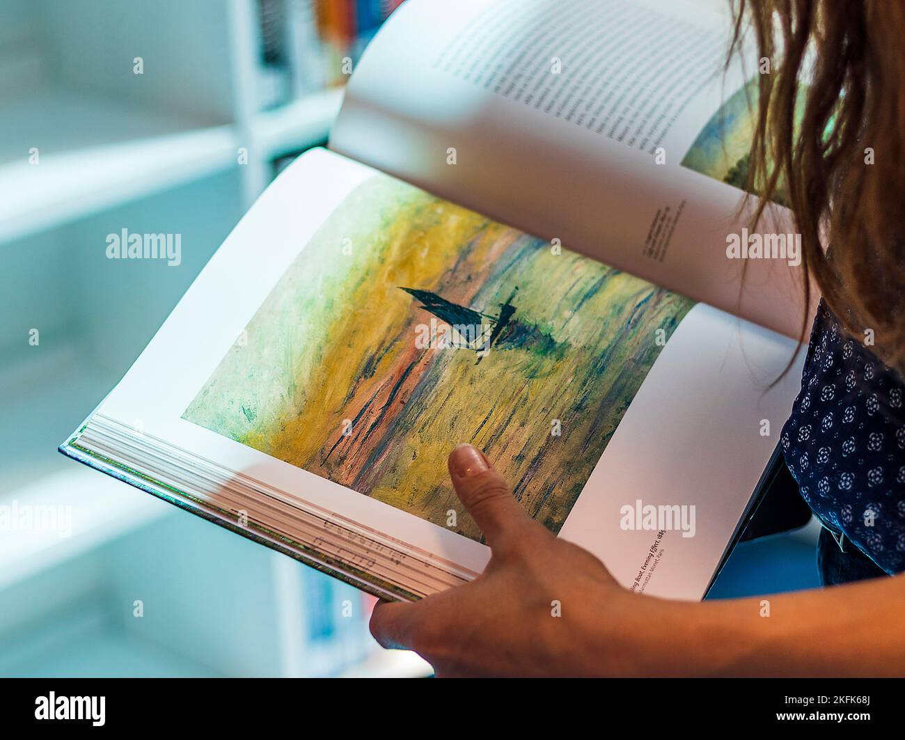 Close up shot of a woman's hands with open book Stock Photo - Alamy