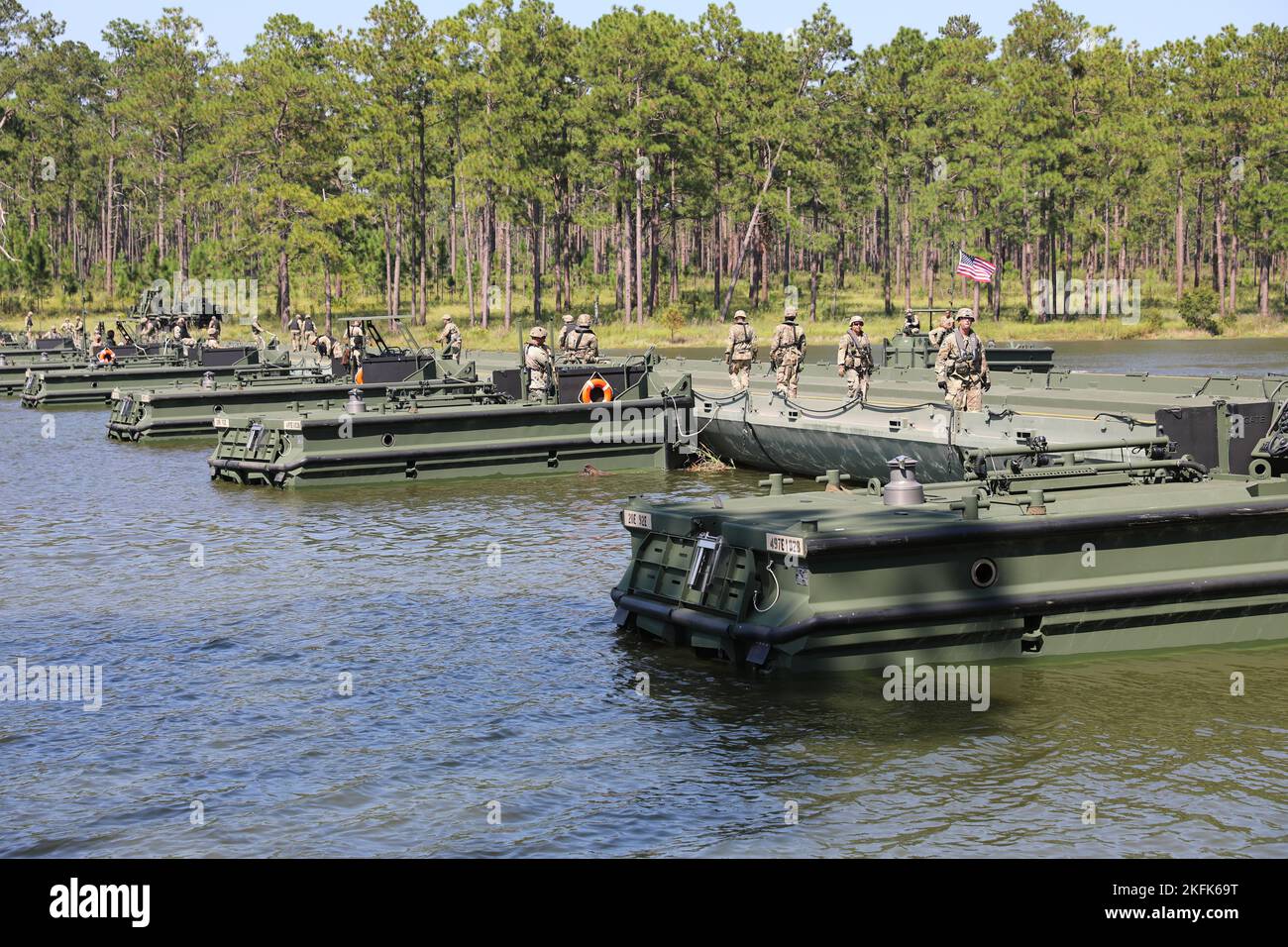 U.S. Army Soldiers assigned to the 497th Multi-Role Bridge Company ...