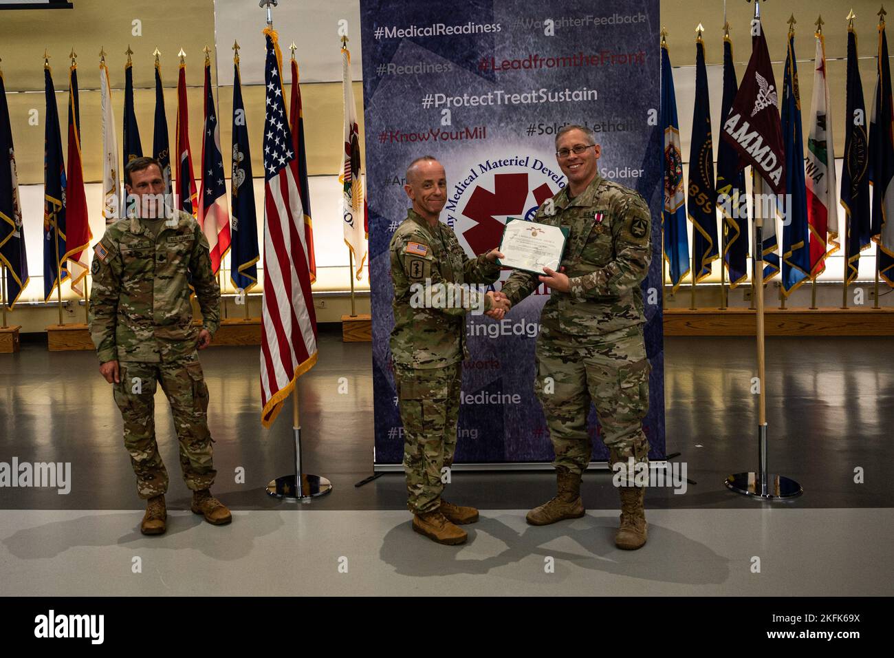 Col. Andy Nuce awards Lt. Col. Stuart Hobbs the Meritorious Service ...