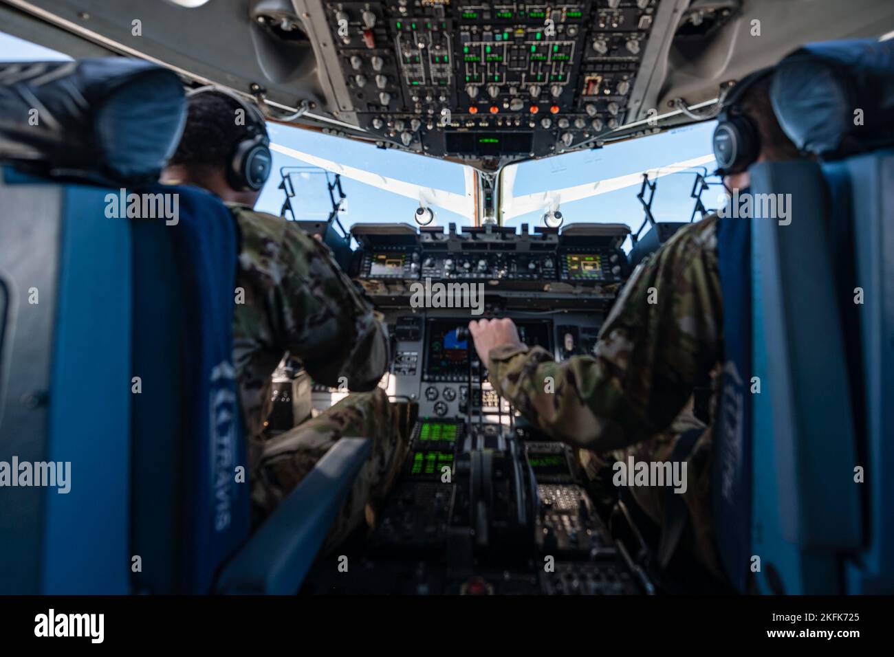 U.S. Air Force Lt. Col. William Street, right, 21st Airlift Squadron ...