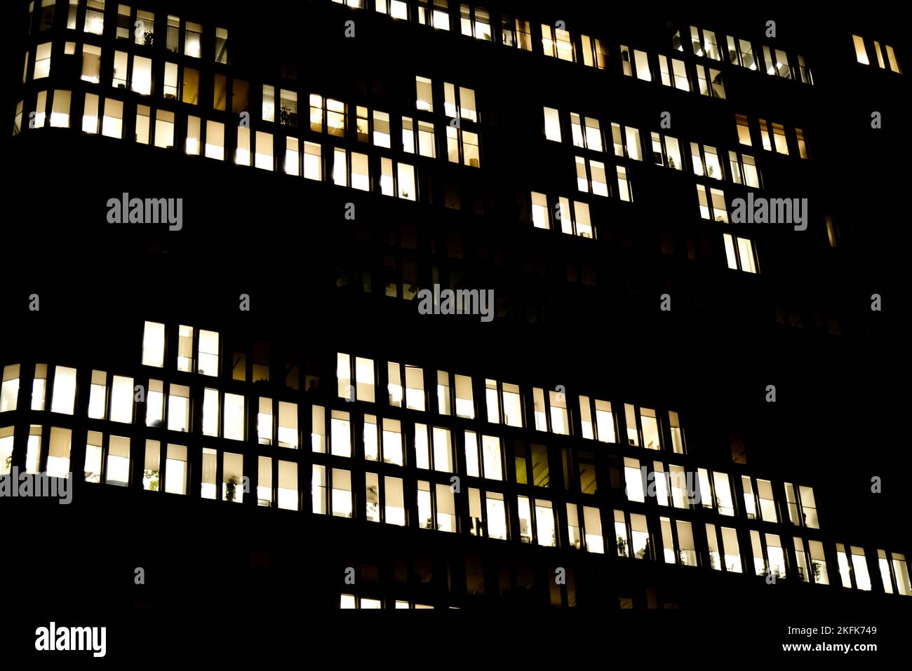 Office building at night - overtime work Stock Photo - Alamy