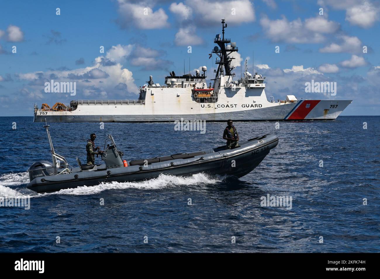 A small boat from the Maldivian Coast Guard ship Ghazee transits near U ...