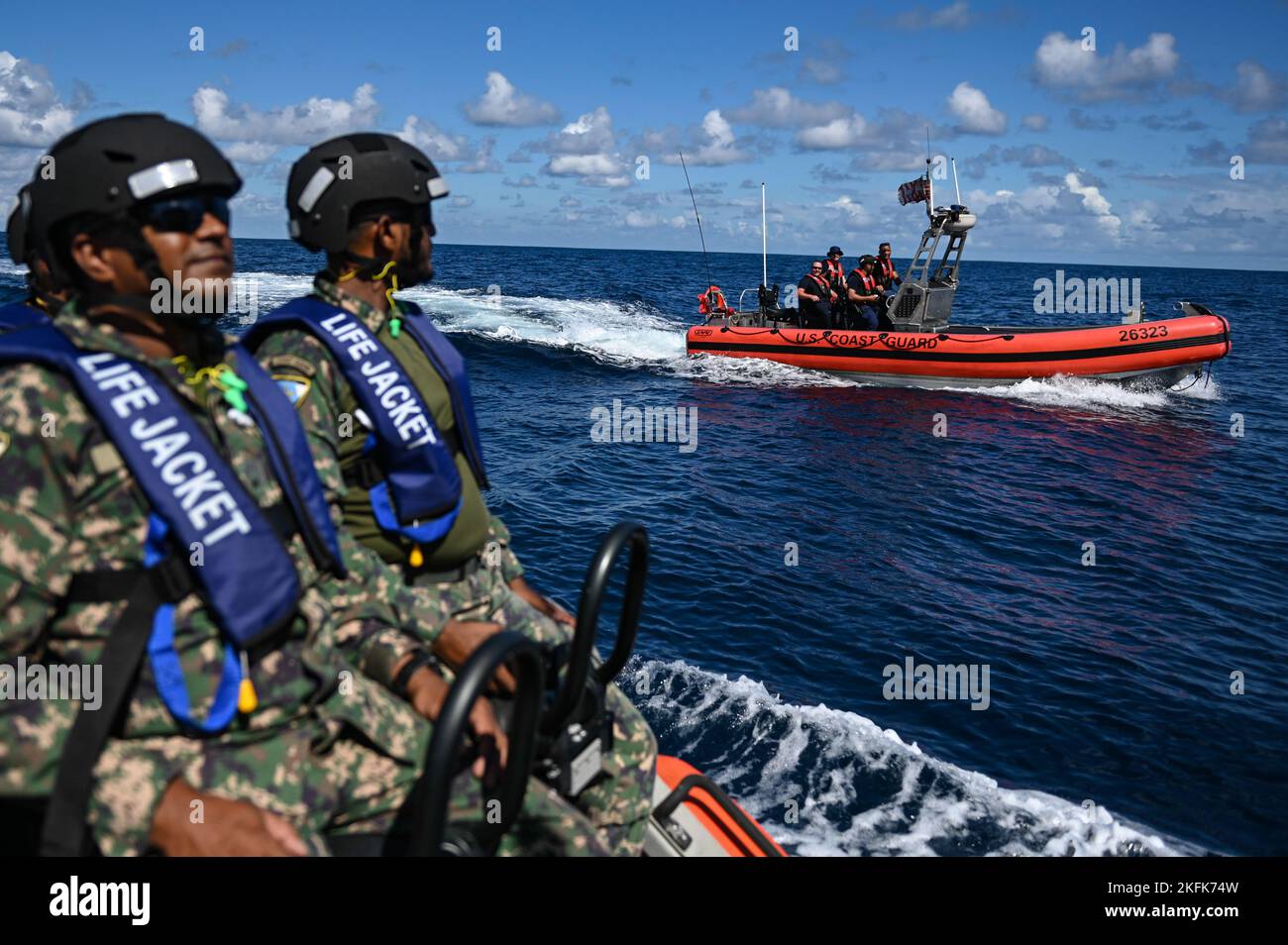 A small boat from U.S. Coast Guard Cutter Midgett (WMSL 757) begins a ...