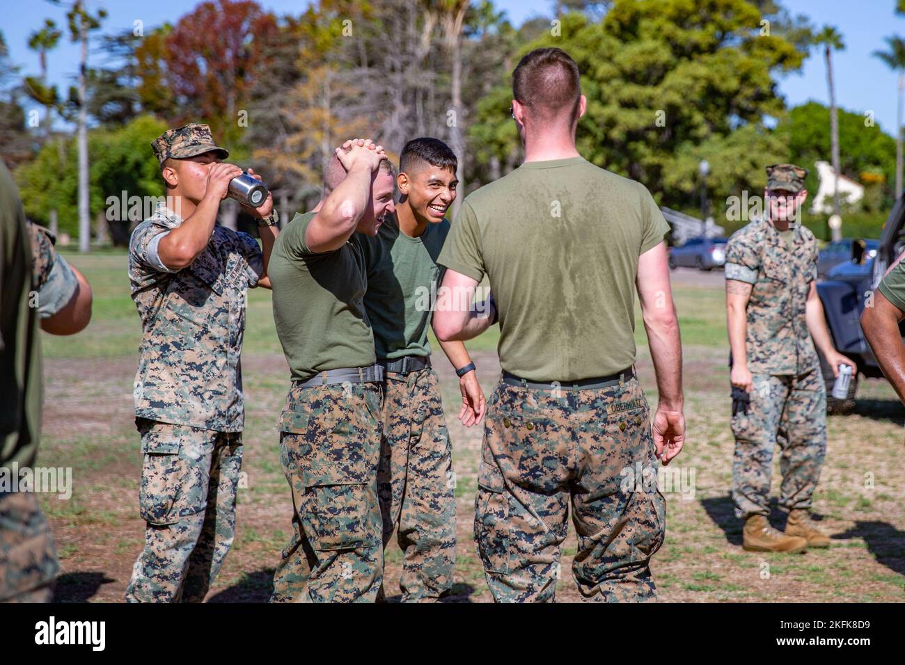 U.S. Marines with Headquarters and Service Battalion, recover from an ...