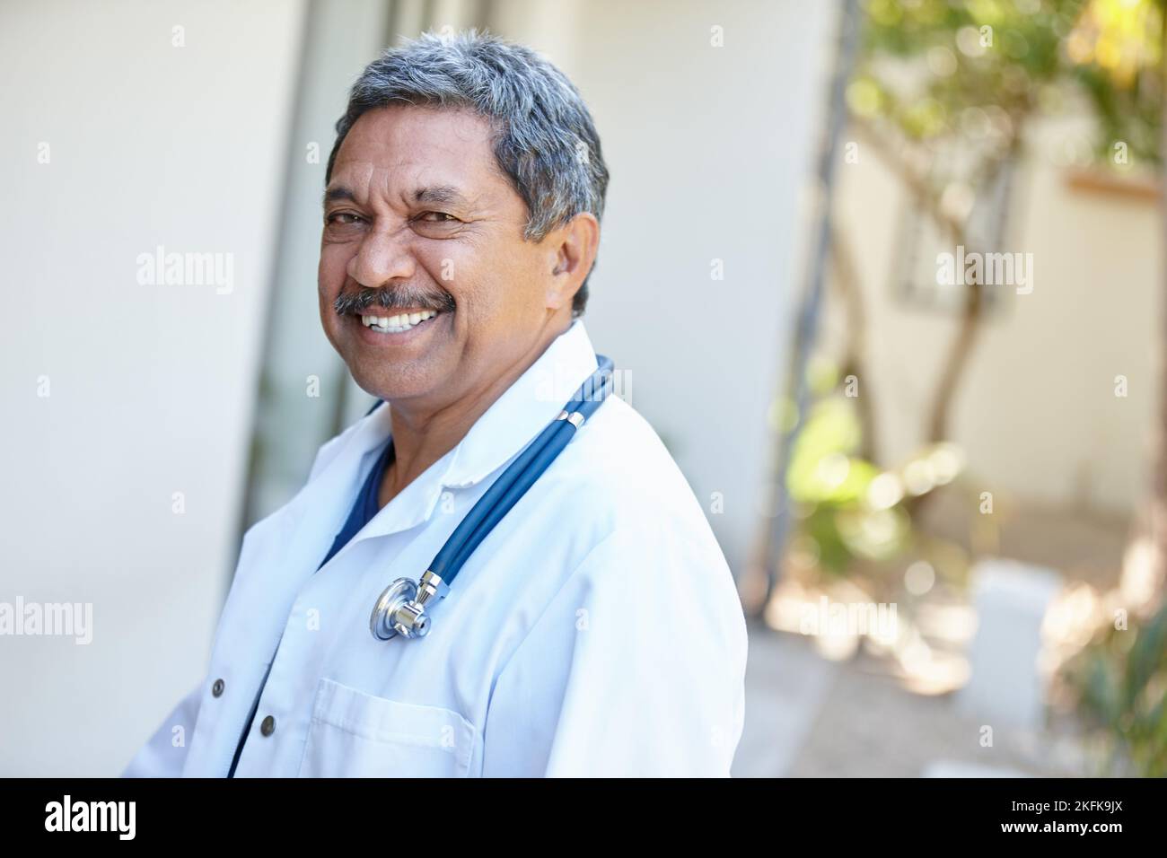 I love being a doctor. Cropped portrait of a male doctor smiling ...