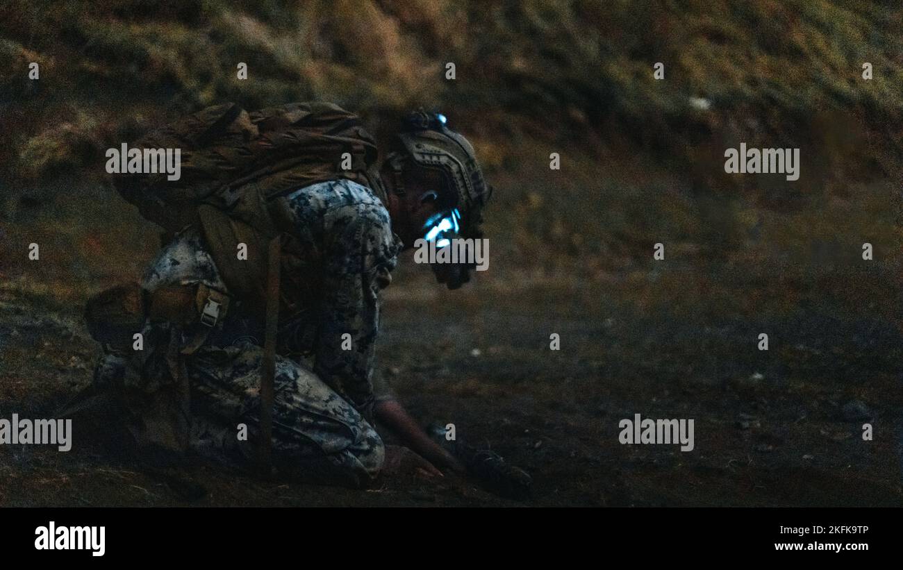 A U.S. Marine Corps explosive ordnance disposal technician with 3d ...