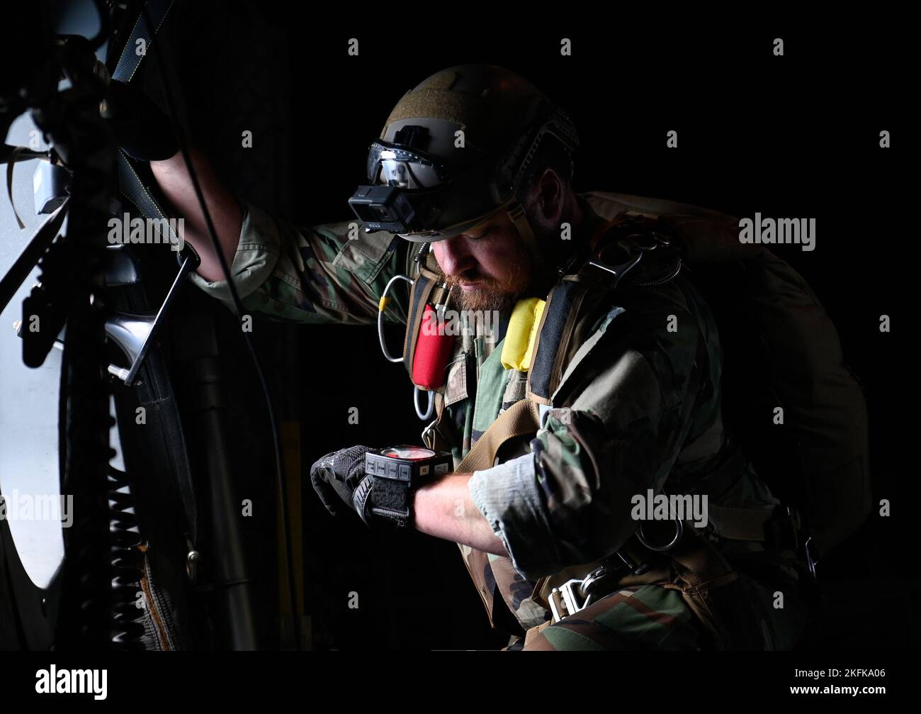 A Jumpmaster from the U.S. Army John F. Kennedy Special Warfare Center ...