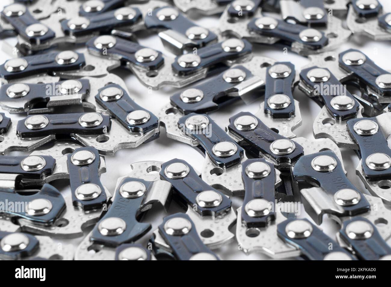 Chainsaw chain background texture. Metal chain link for chainsaw. New ...