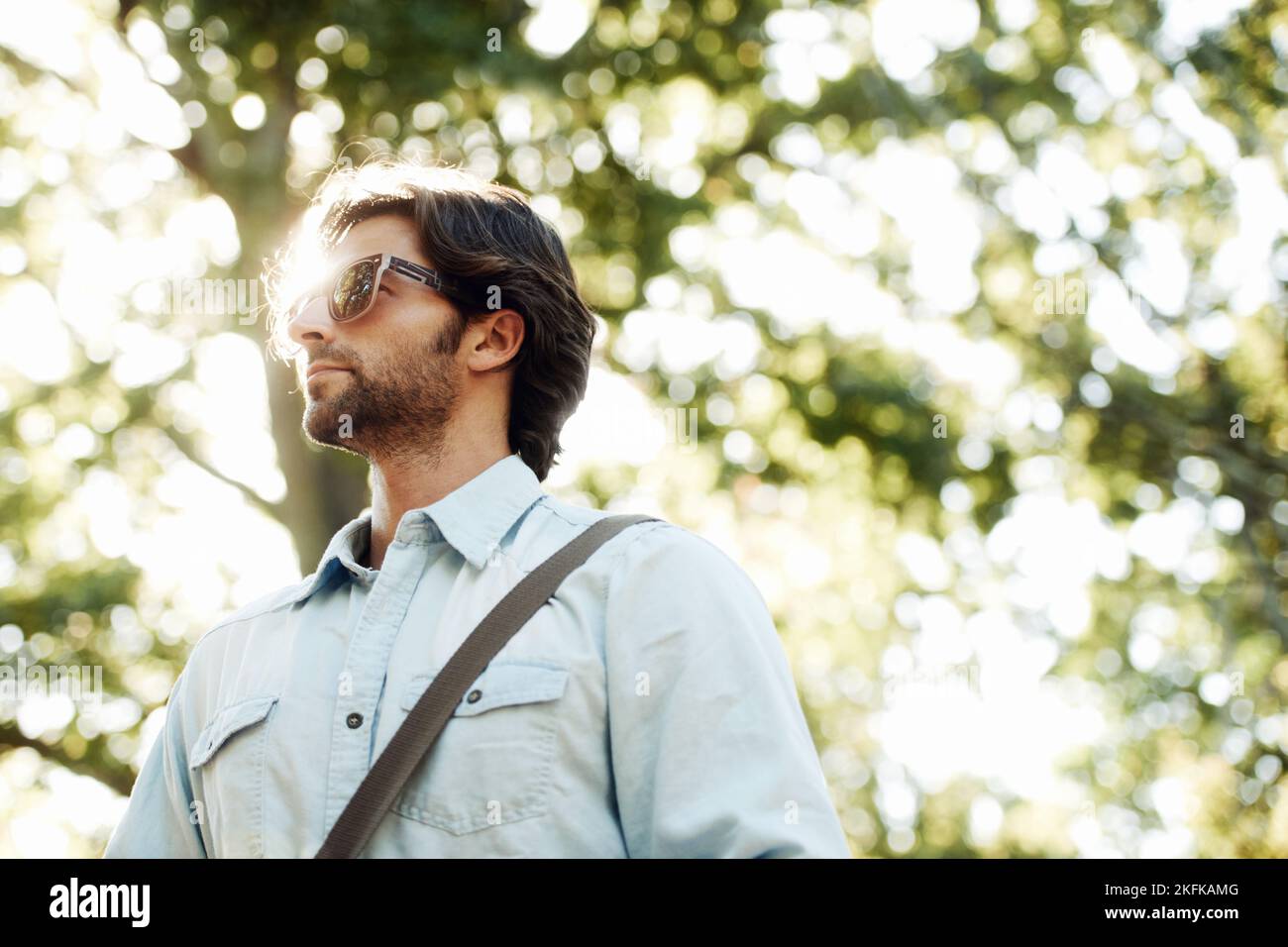 So many things to see. a handsome young tourist checking out the sights ...