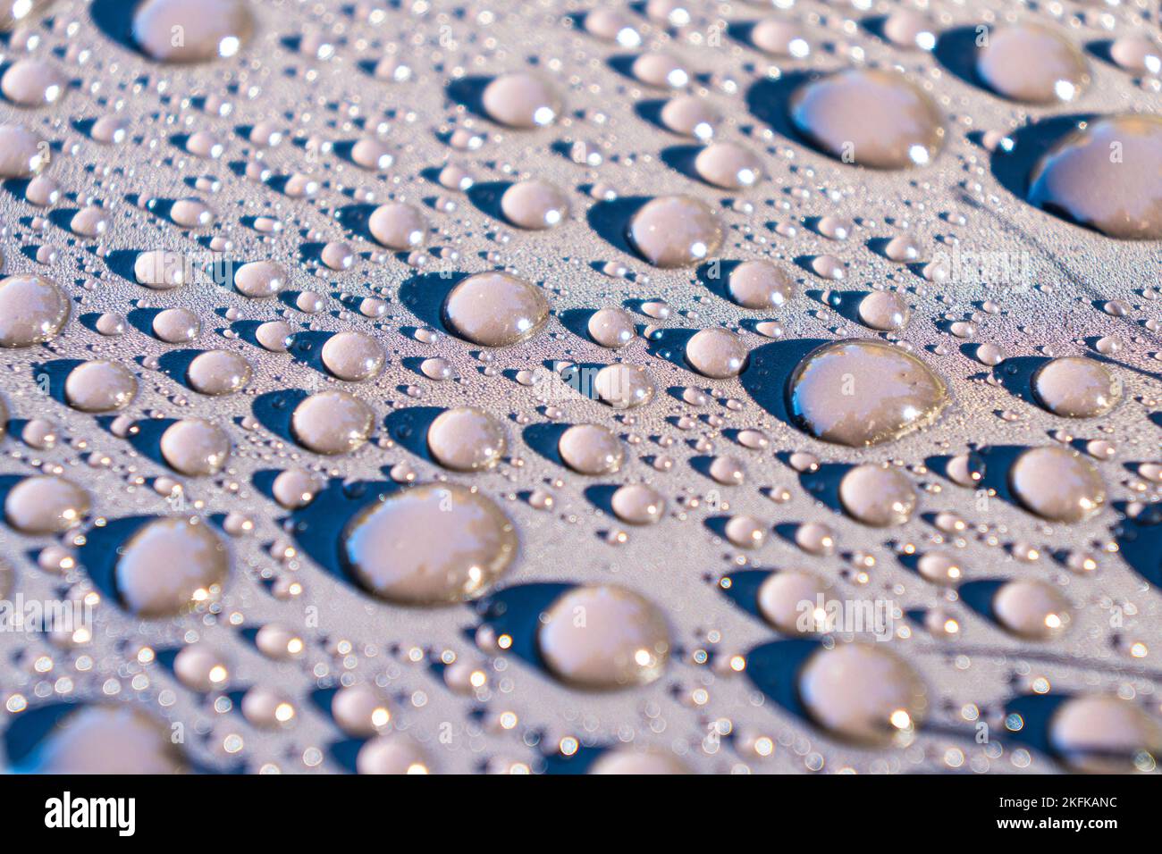 Shiny water drops on metallic surface. Water drops texture background ...
