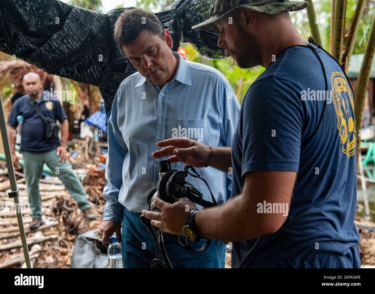 U.S. Navy Petty Officer First Class Dallas Benton, a diver assigned to ...