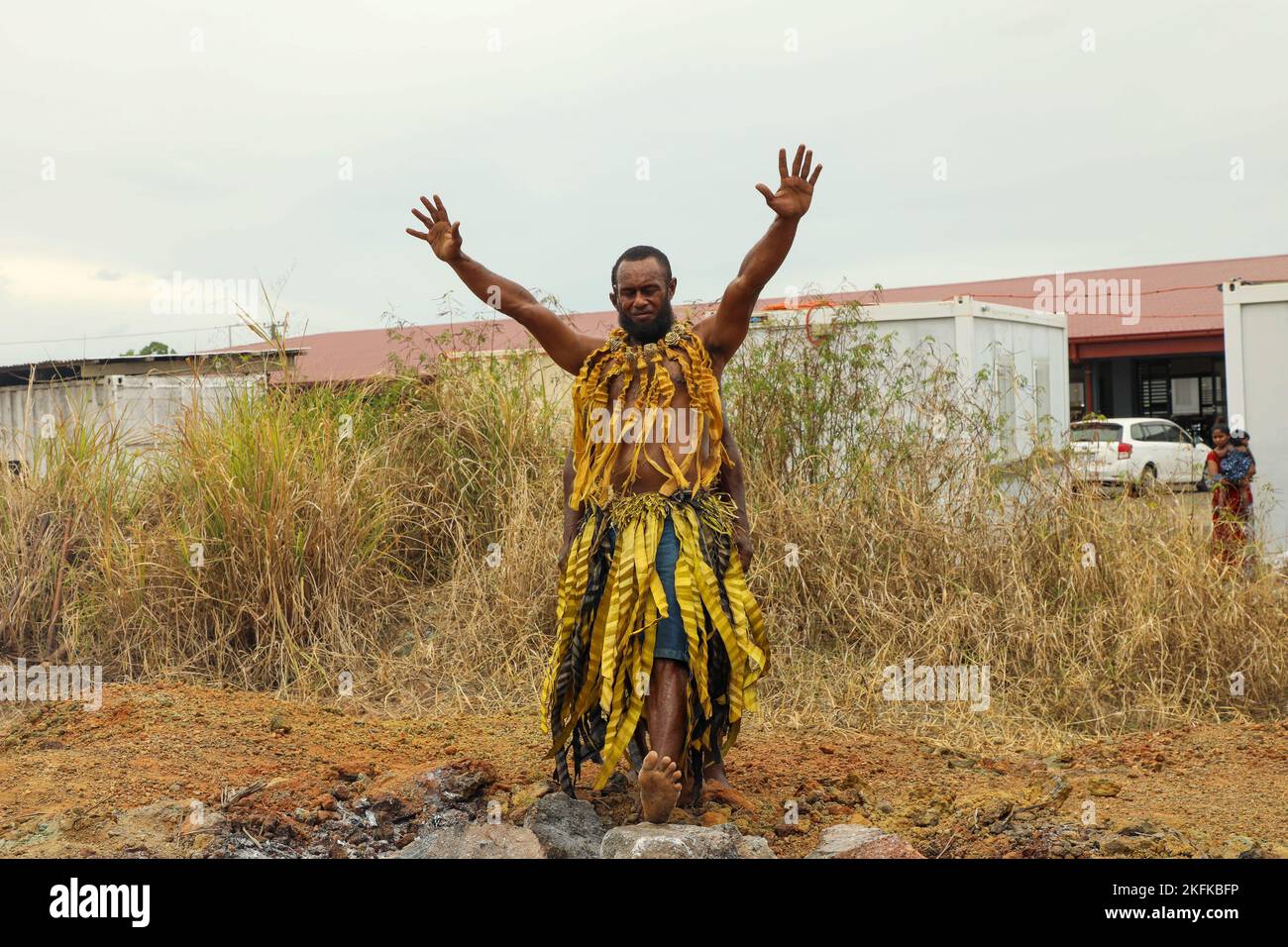 A Fijian firewalker demonstrates his determination during the closing ...