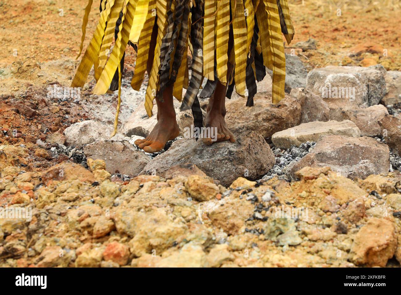A Fijian firewalker demonstrates his determination during the closing ...
