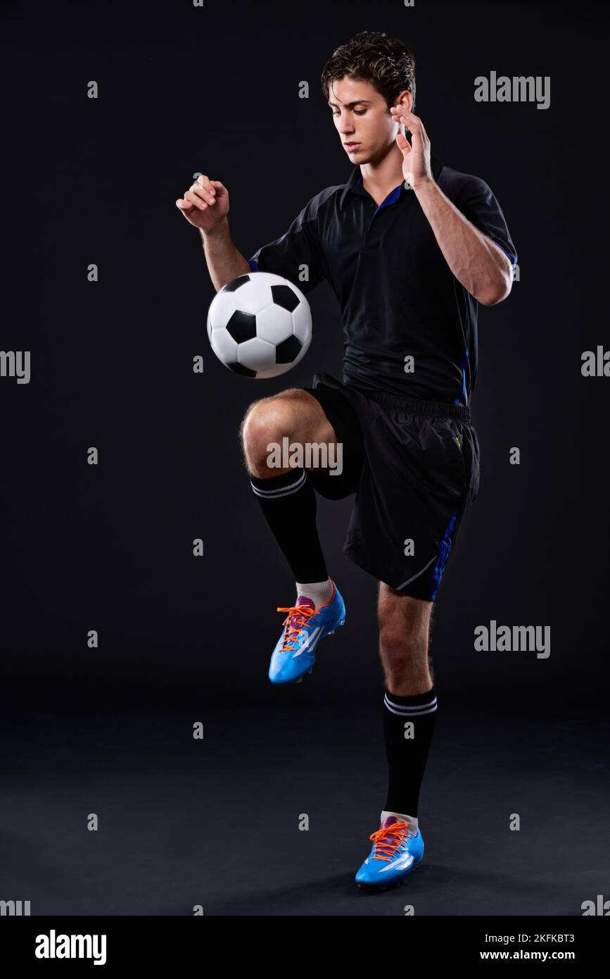 Do it with passion or not at all. Full length studio shot of a handsome ...