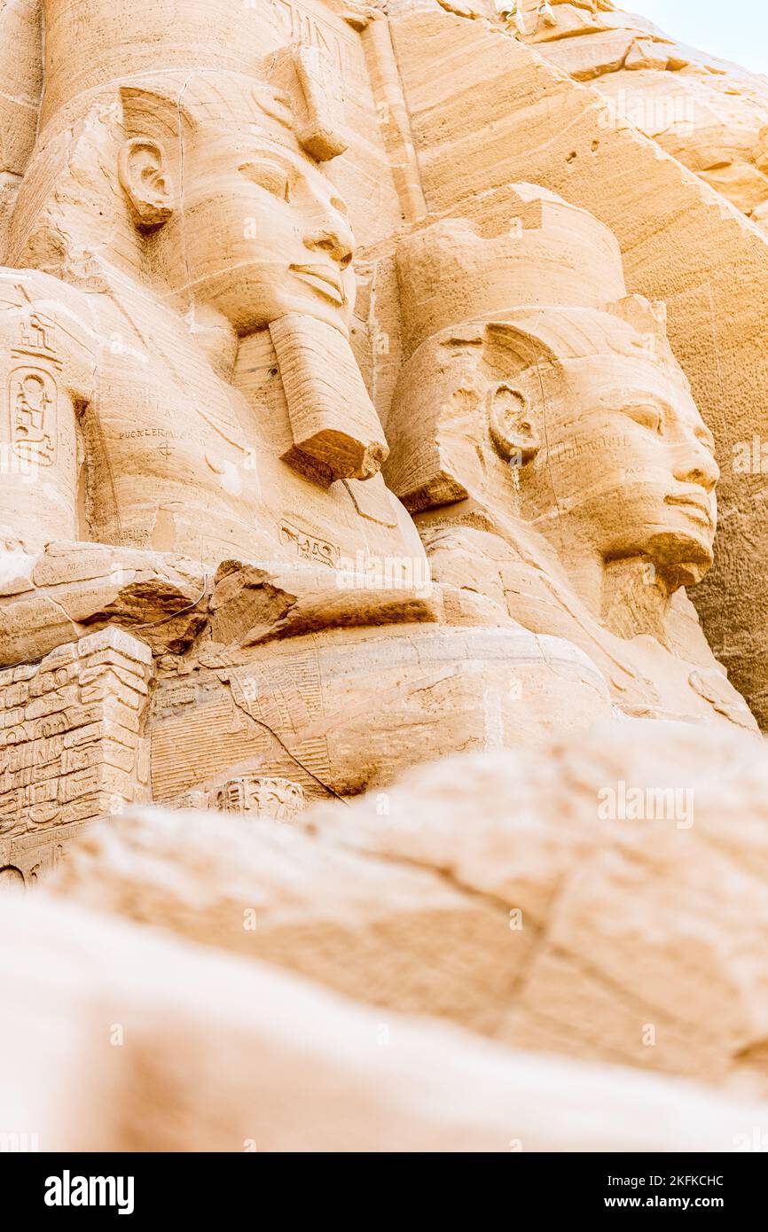 Majestic statues of a pharaoh in an egyptian temple Stock Photo - Alamy