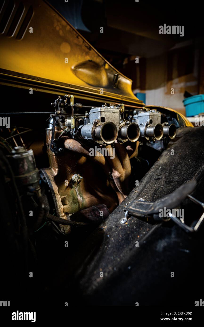 The vertical close-up shot of a classic car's engine parts Stock Photo ...