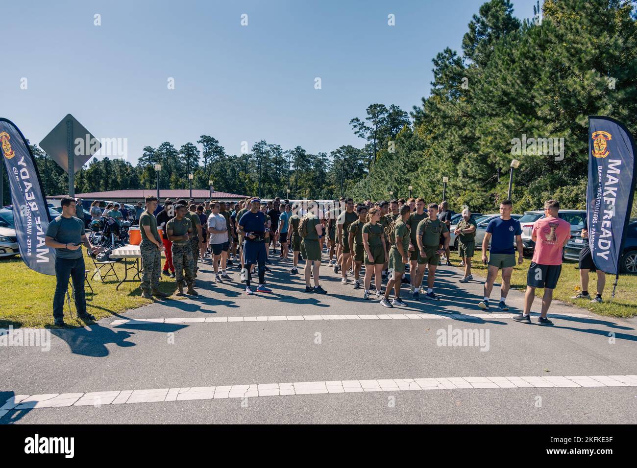 U.S. service members and civilians from Marine Corps Base (MCB) Camp ...