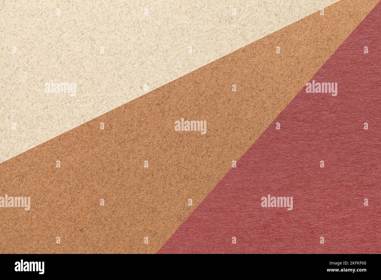 Texture of old craft beige, brown and maroon color paper background ...