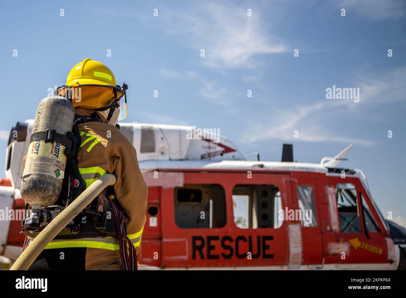 U.S. Marine Corps Lance Cpl. Jack Deitrick, an aircraft firefighting ...