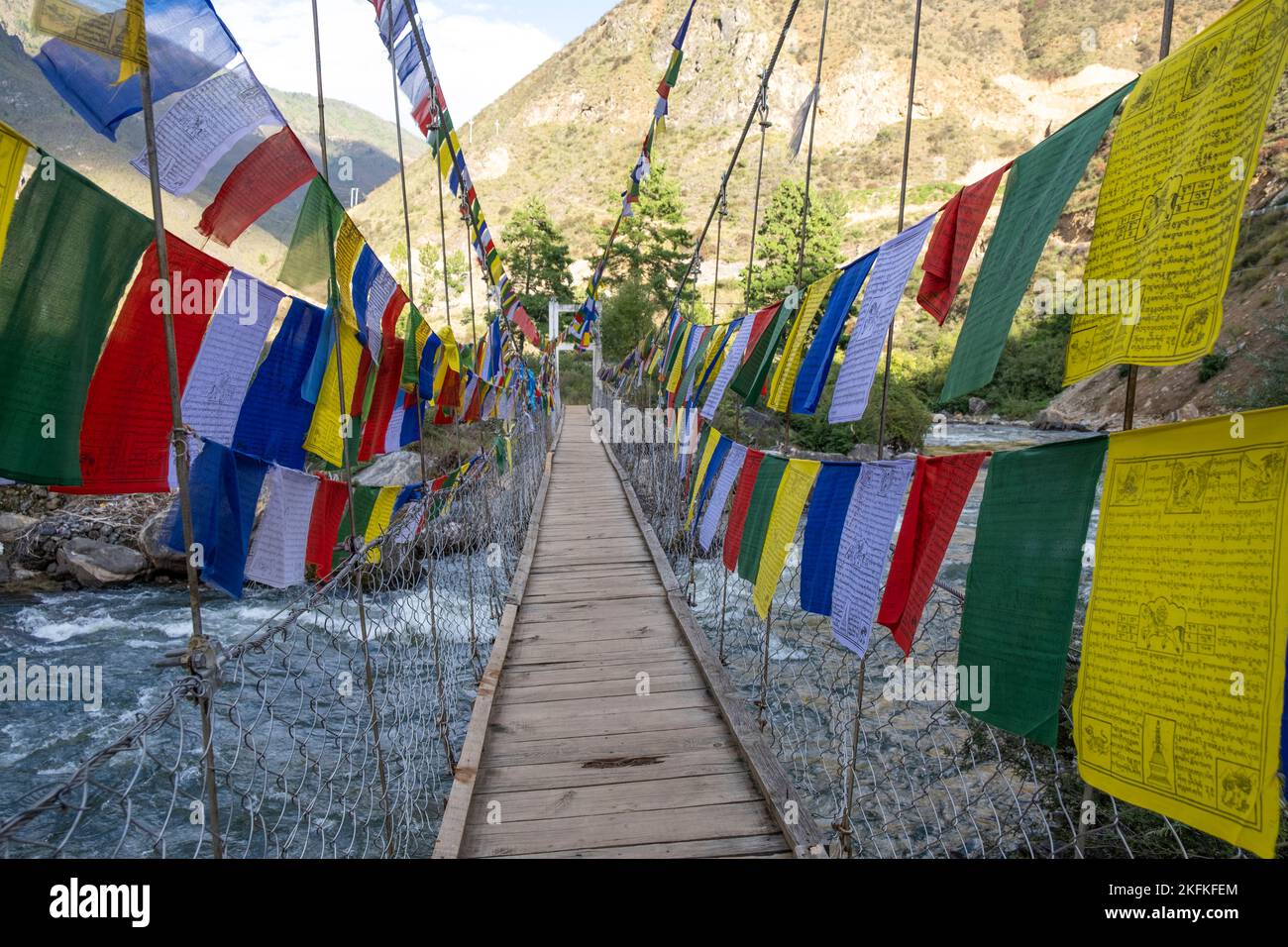 Prayer Flags Hanging On A Bridge in Bhutan Stock Photo - Alamy