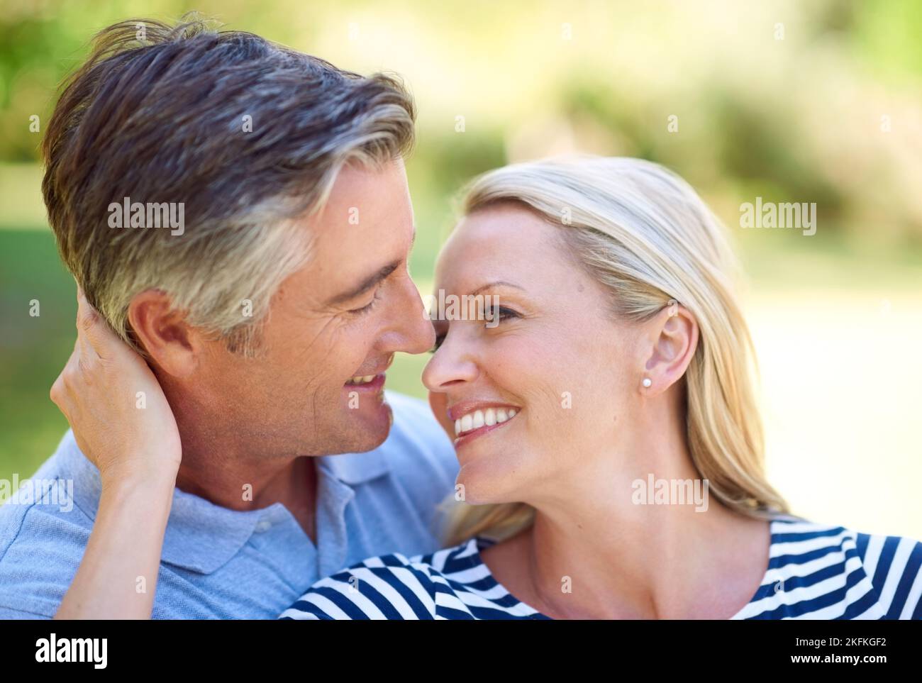 Im proud to call you my husband. an affectionate mature couple standing ...