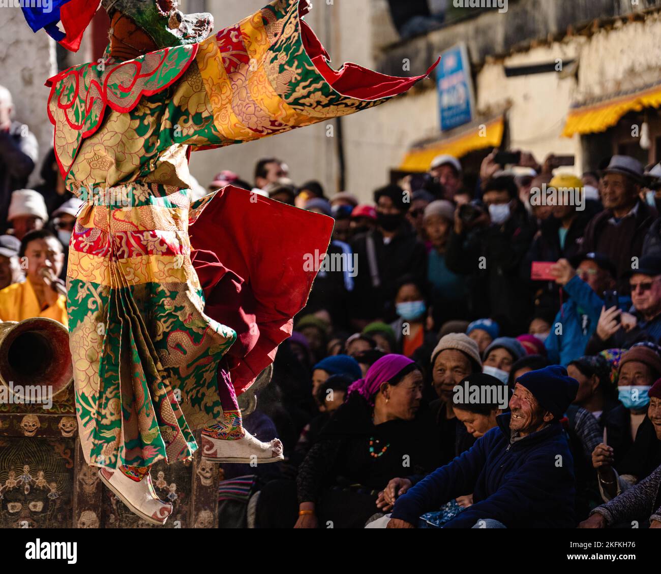 A Tibetan Buddhist dancer in traditional demon spirit ghost clothing in ...