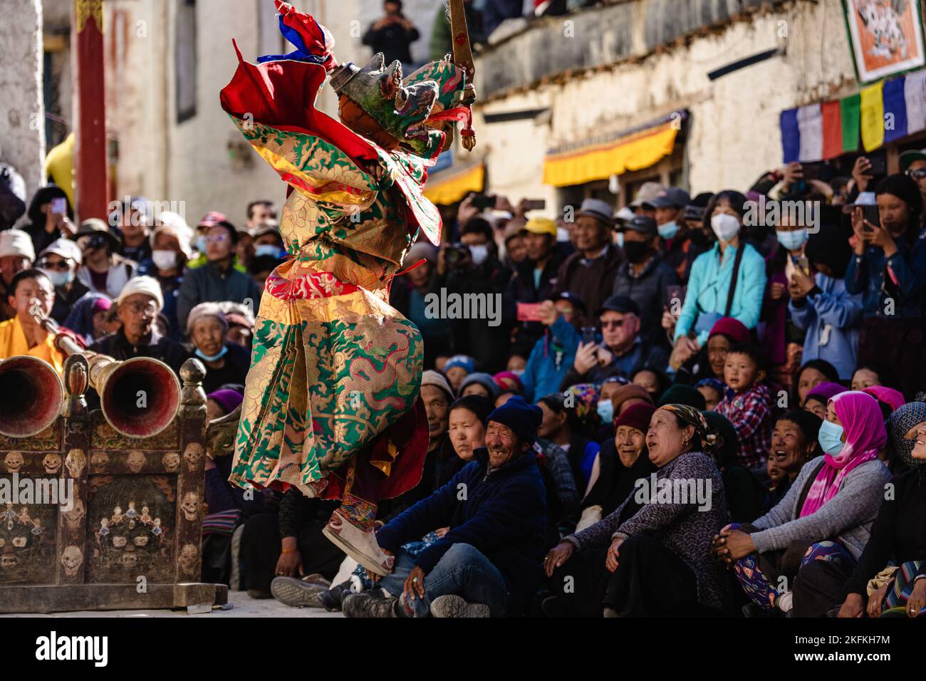 A Tibetan Buddhist dancer in traditional demon spirit ghost clothing in ...