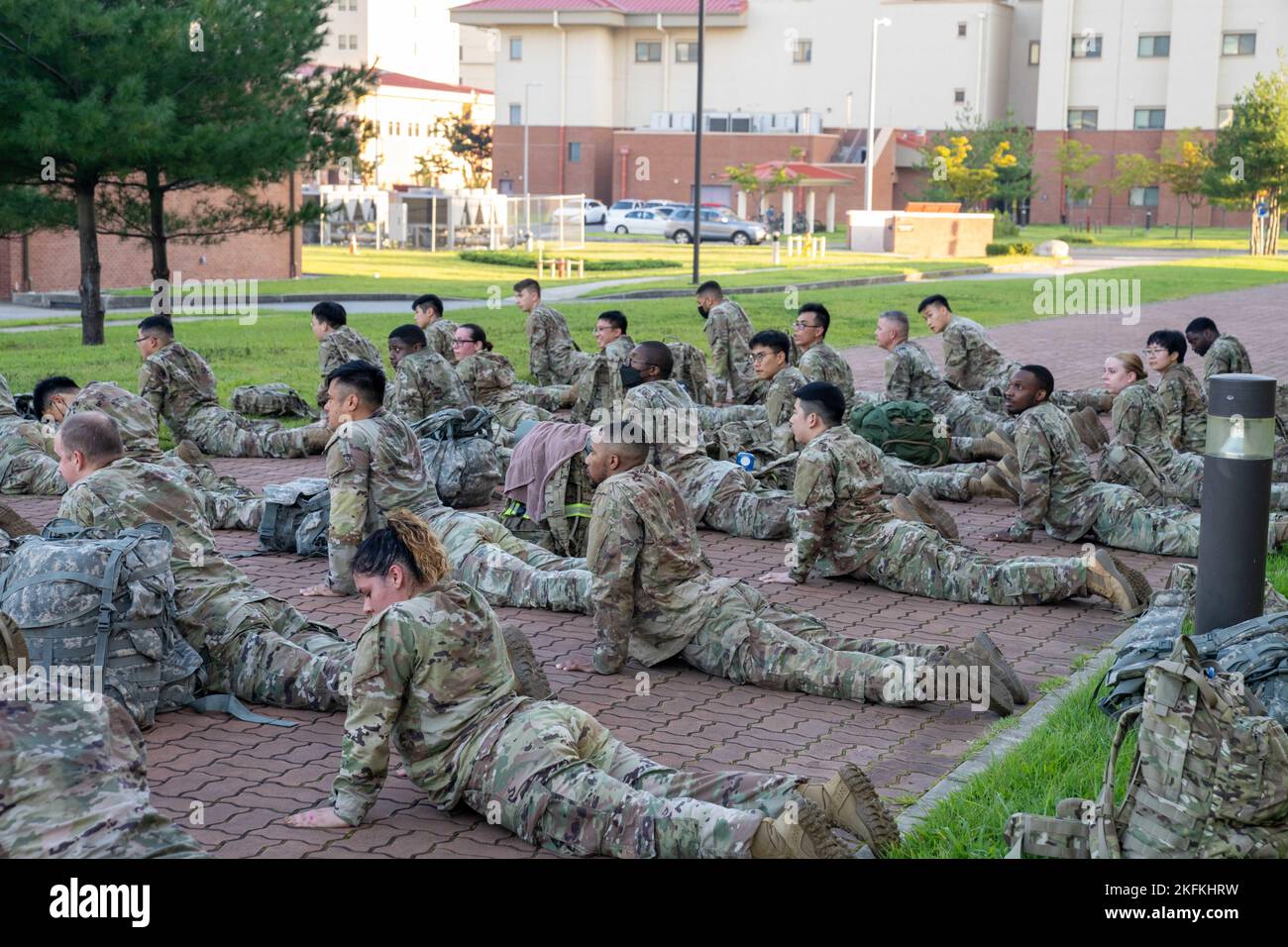 Soldiers in Headquarters Company participate in a ruck march for their ...