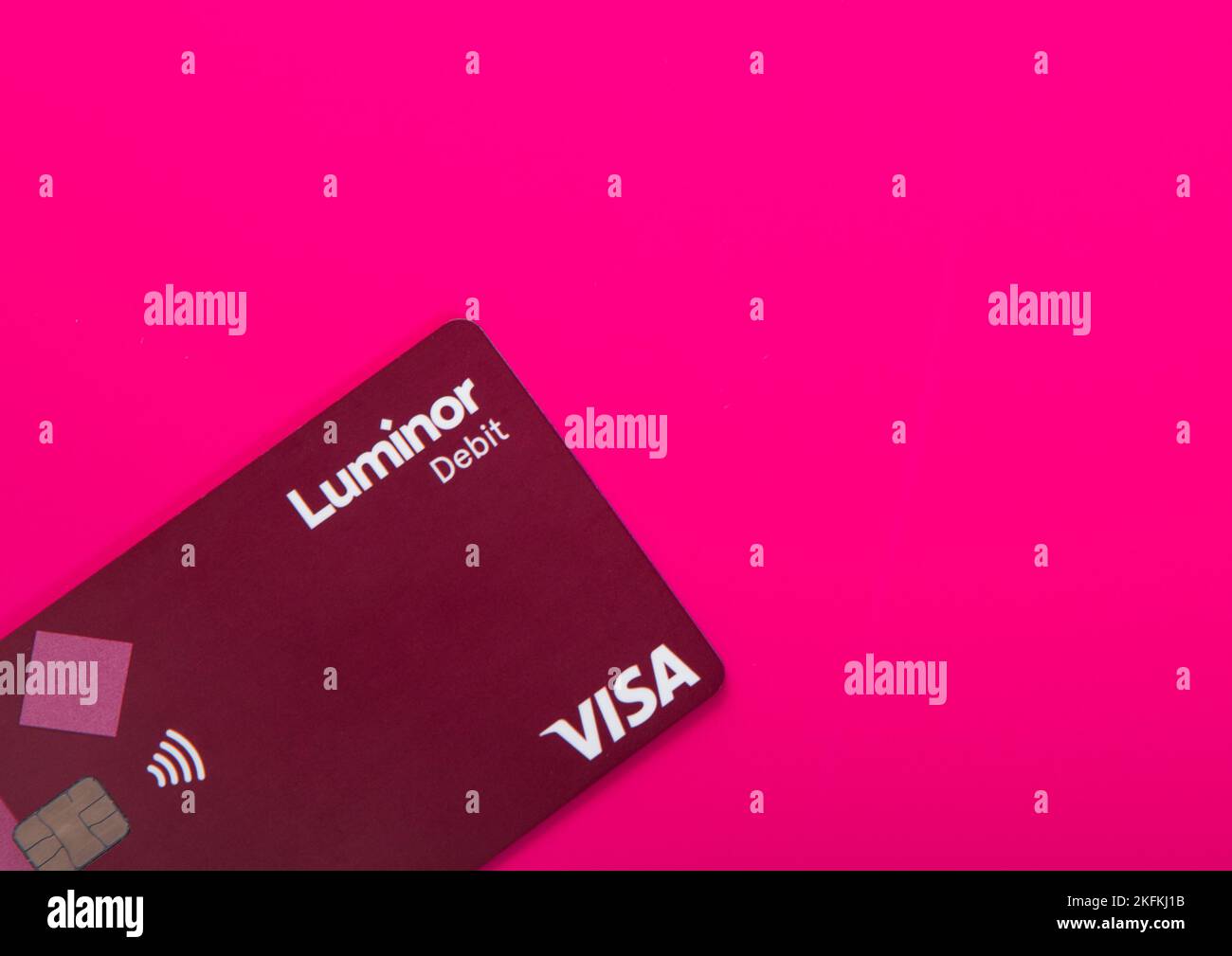 LONDON,UK - NOVEMBER 12, 2022: Luminor Visa debit contactless card on ...