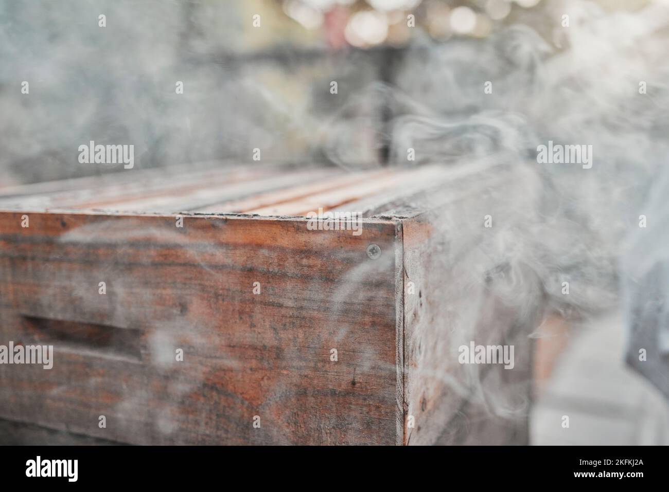 Smoke, wood box and bee farm or agriculture background for beekeeping ...