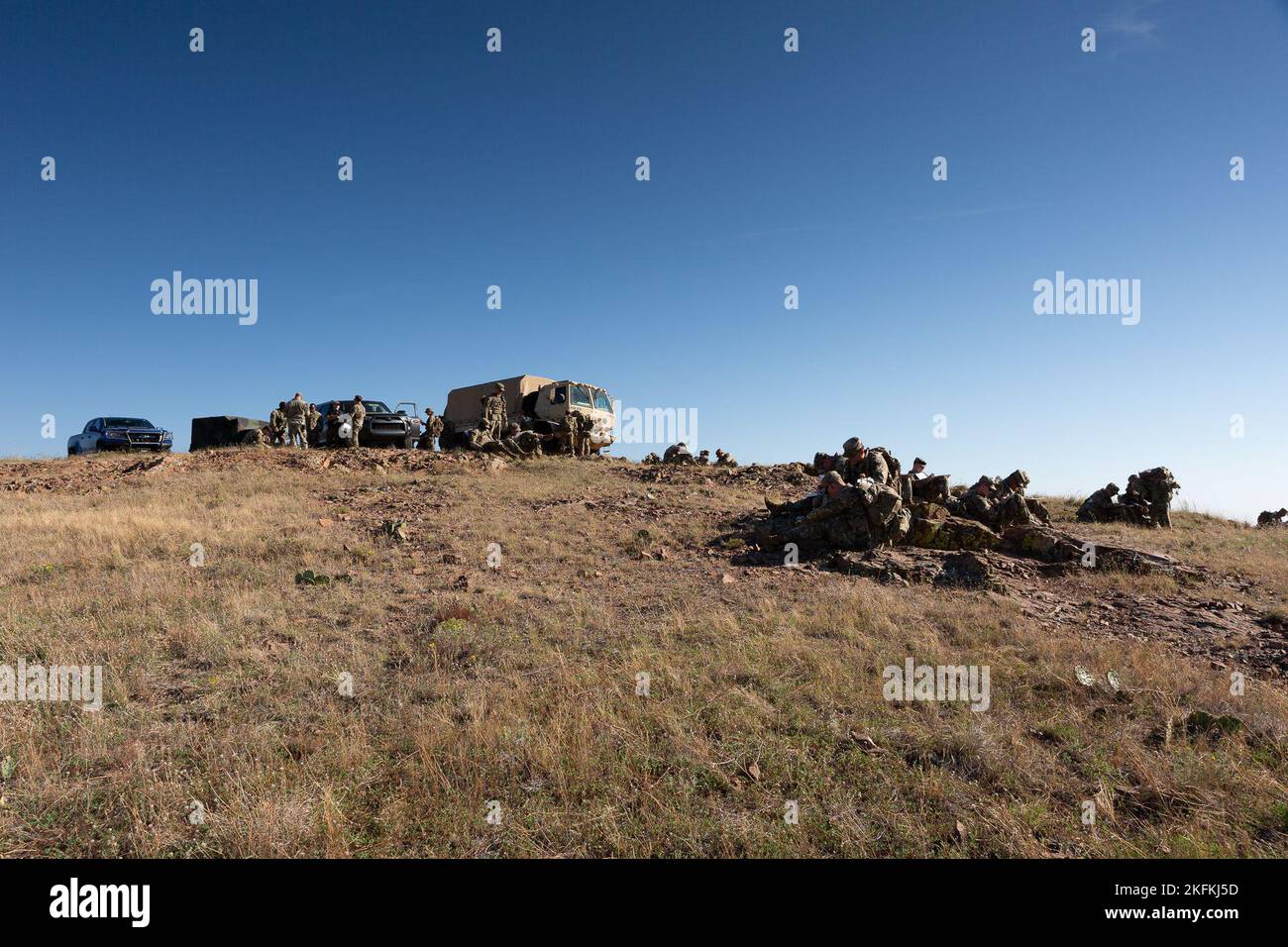 Advanced Individual Training students rest and prepare their maps ...