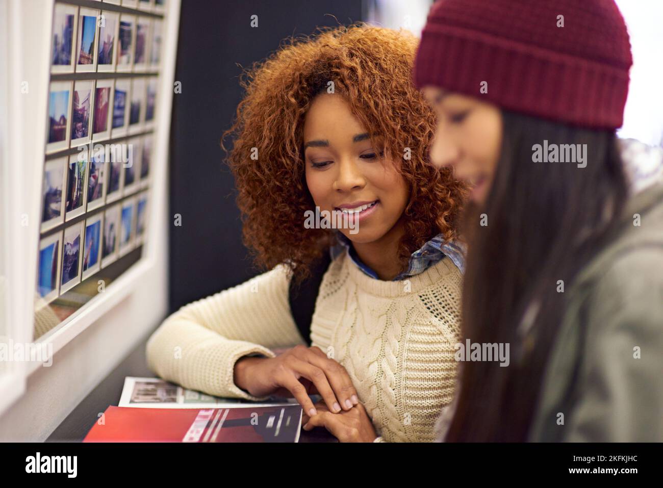 Working together to prepare for finals. two young women studying ...