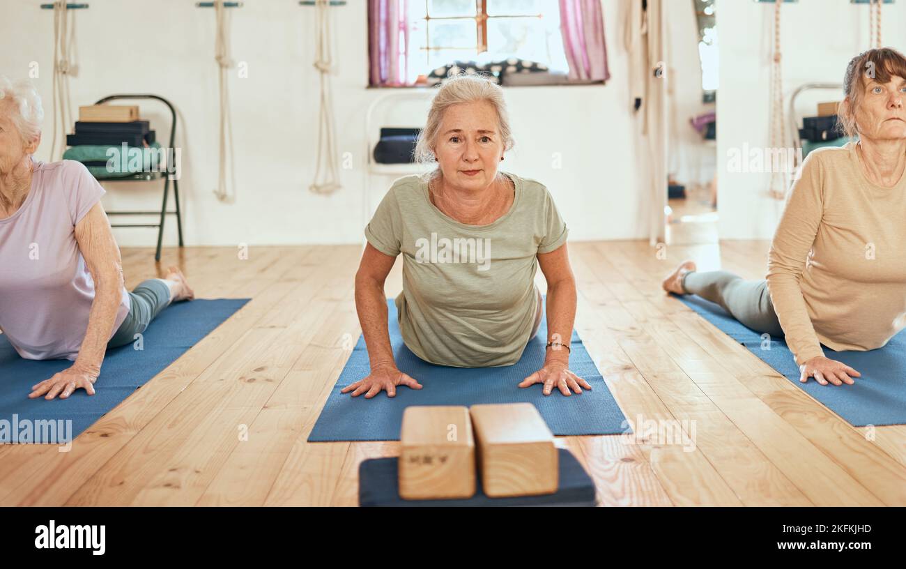Pilates, studio and senior friends doing a stretching exercise for ...
