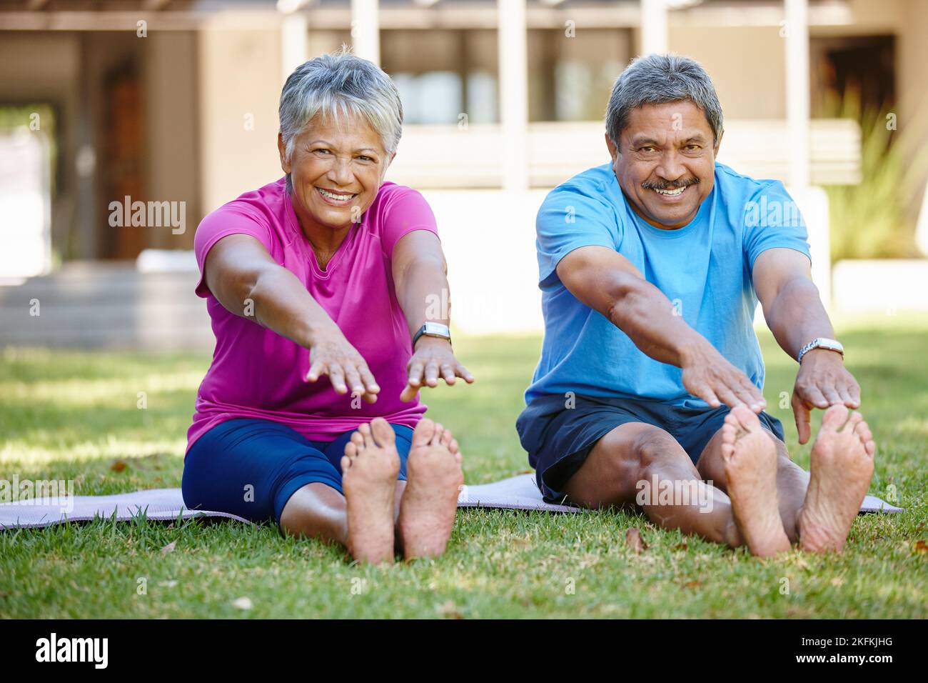 Exercising together couldnt be more enjoyable. Portrait of a mature ...