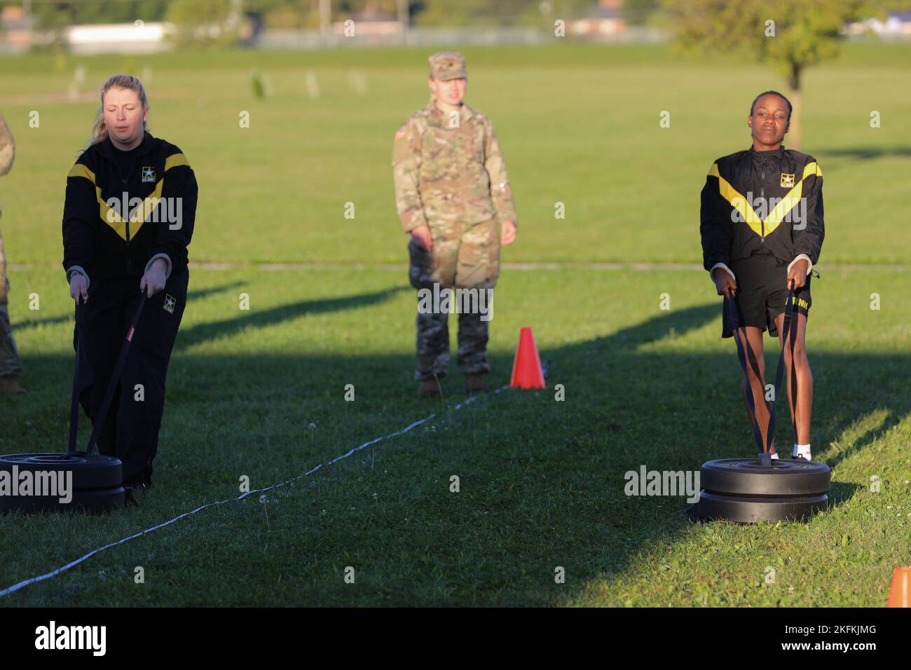U.S. Army Sgt. Kora James, left, property book non-commissioned officer ...