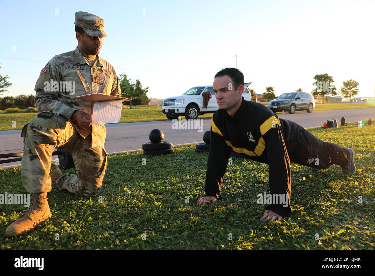U.S. Army Spc. Robert Collins, left, human resources specialist ...