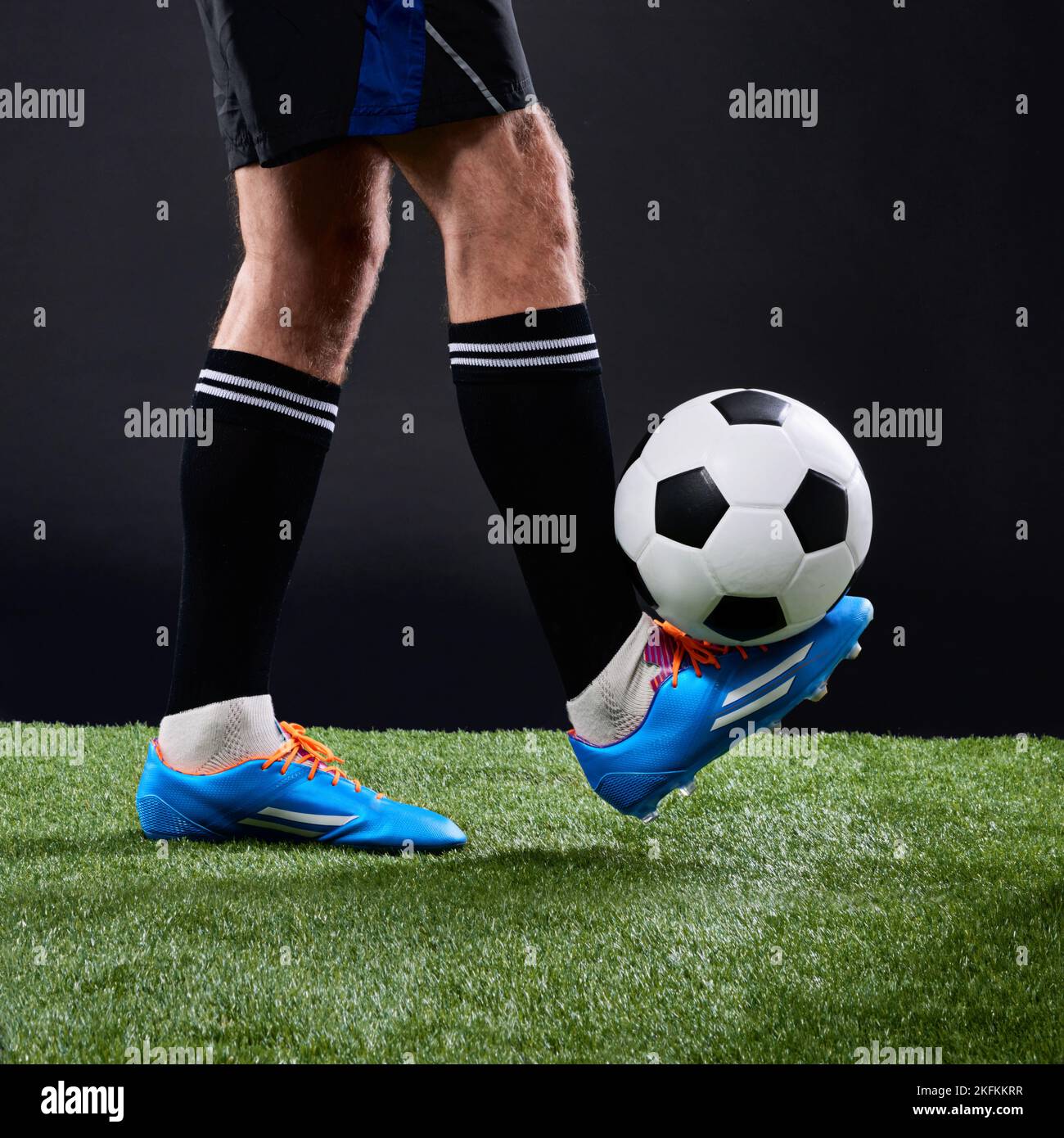 Its all about balance. a soccer player playing soccer Stock Photo - Alamy