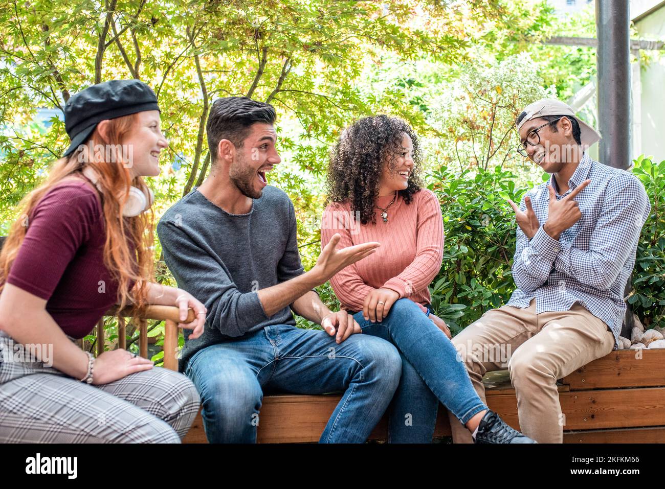 young people having fun in a open bistrot, gen z groupo of friends ...