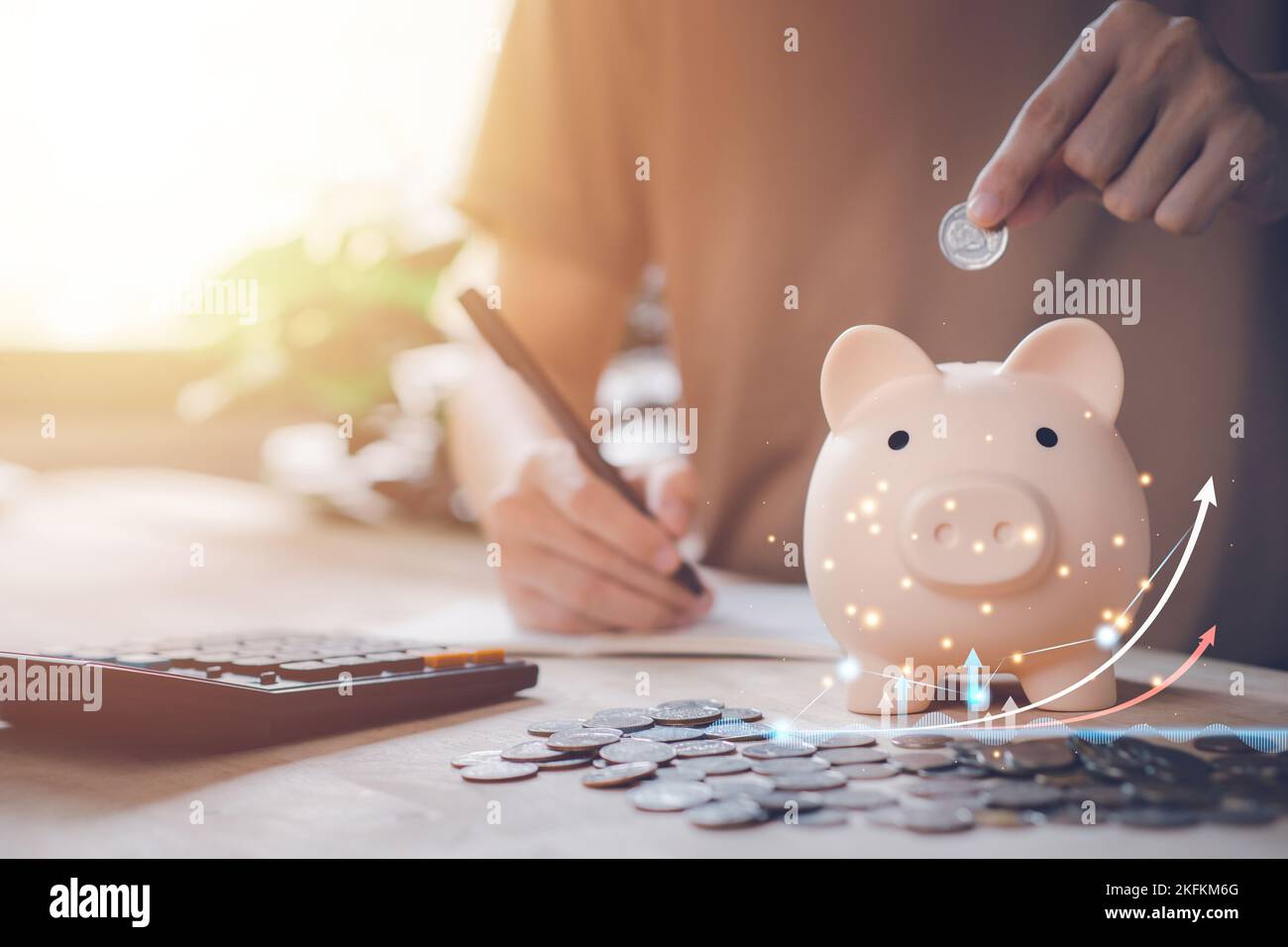 Piggy bank on wood table. Saving money wealth and financial increased ...