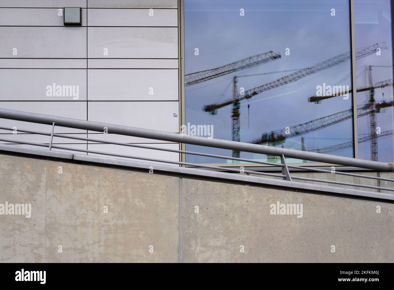 Reflections of a Construction site in a window at HafenCity Hamburg ...