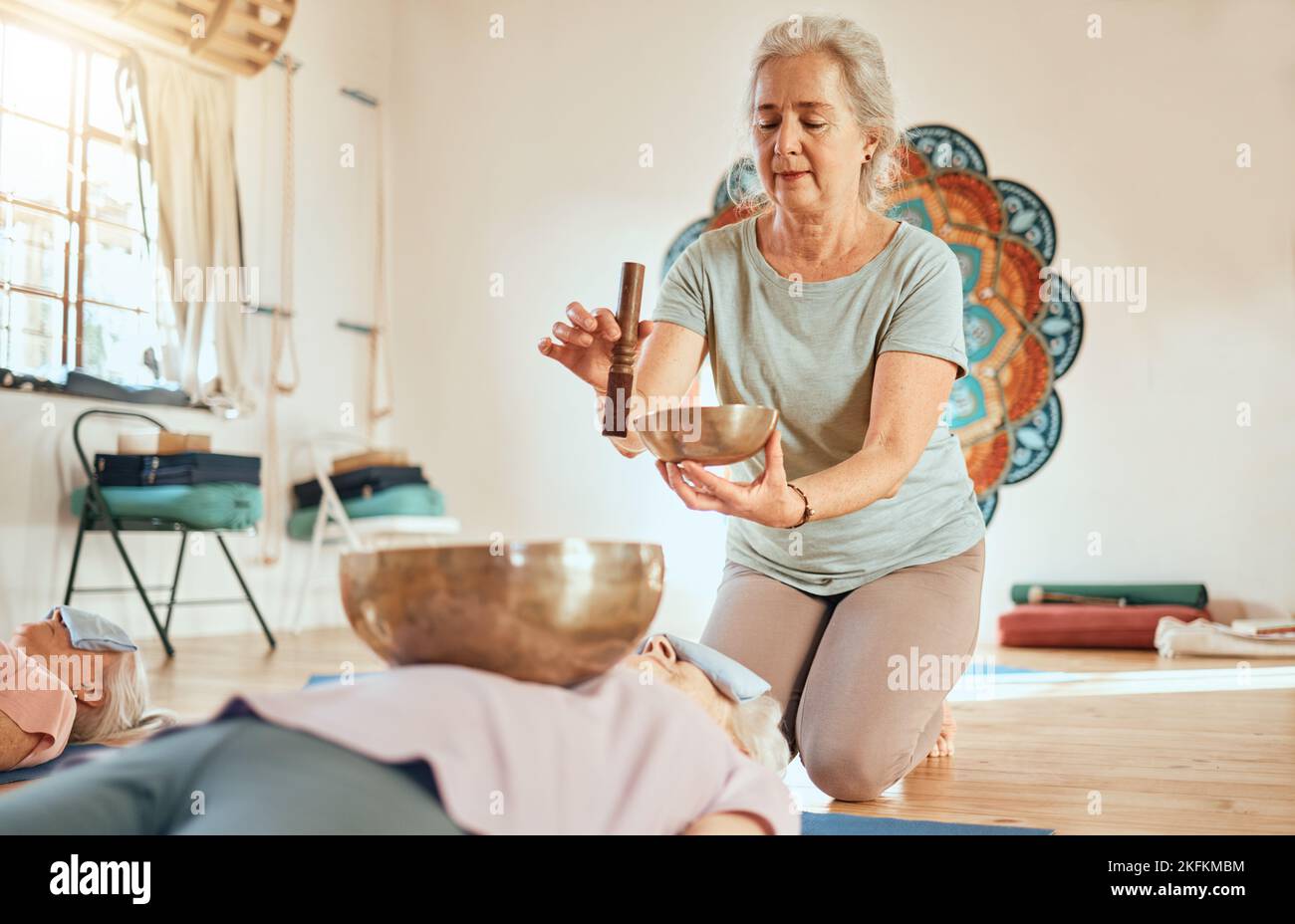 Meditation Tibetan Bowl And Zen Senior Women Doing A Sound Healing Or