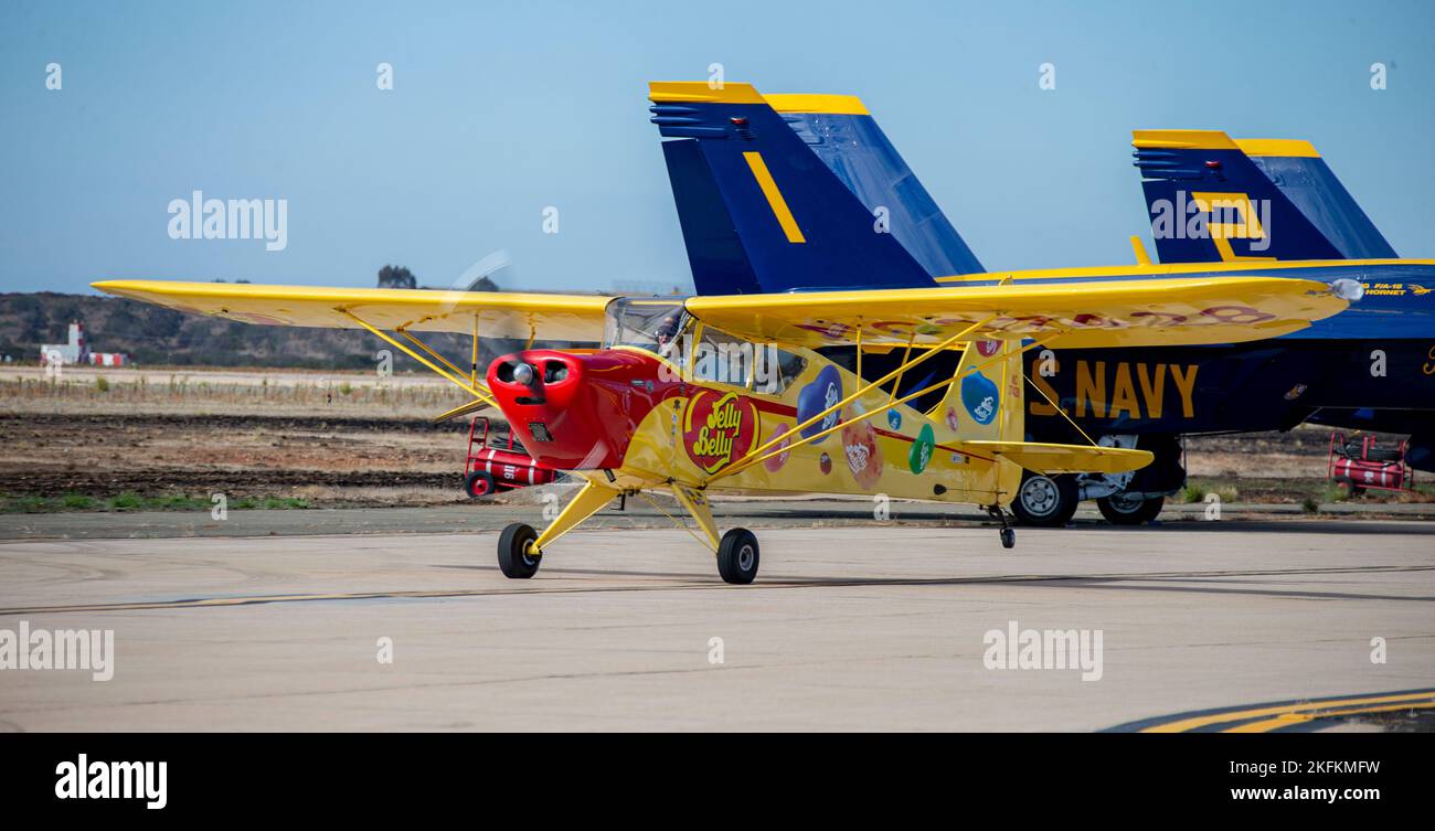 Kent Pietsch, piloting his Interstate Cadet, performs aerobatics during ...