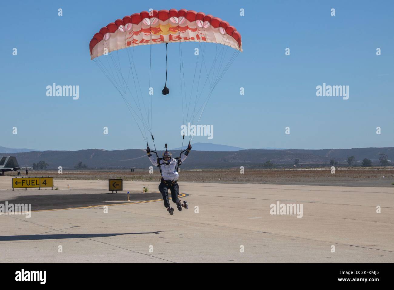 A member of the Red Bull Air Force team lands after conducting an ...